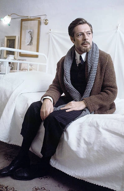ITALIAN ACTOR MARCELLO Mastroianni Sitting On A Bed In The Film Down ...
