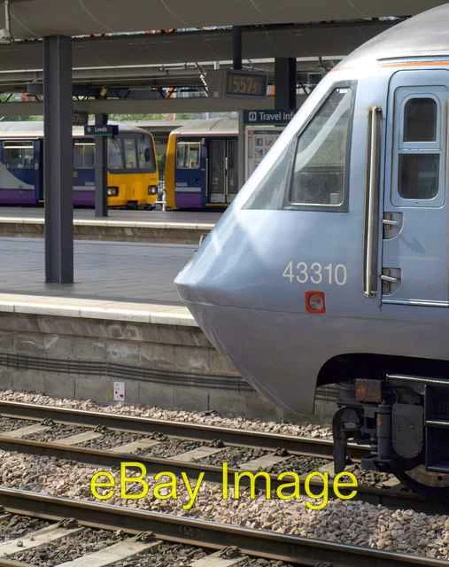 PHOTO 6X4 TRAINS at Leeds Station A class 43 waits at platform 8a, with ...