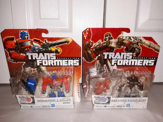 TRANSFORMERS IDW OPTIMUS Prime Roller + Megatron Chop Shop Legends NEUF ...
