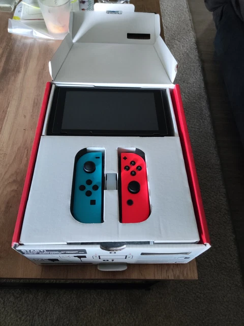 NINTENDO SWITCH 32 Go Console Portable avec Manettes Joy-Con Bleu Néon ...