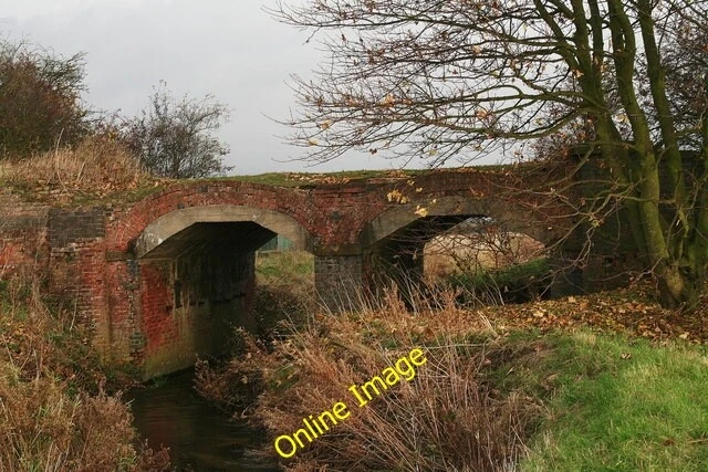 PHOTO 6X4 WAITHE Beck passing under the disused railway West side. The ...
