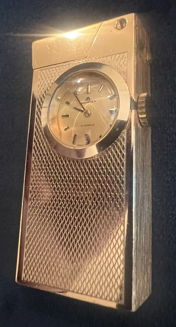 TOP QUALITY RIVO Gold Plated Lighter With Built In Bucherer Watch £145. ...