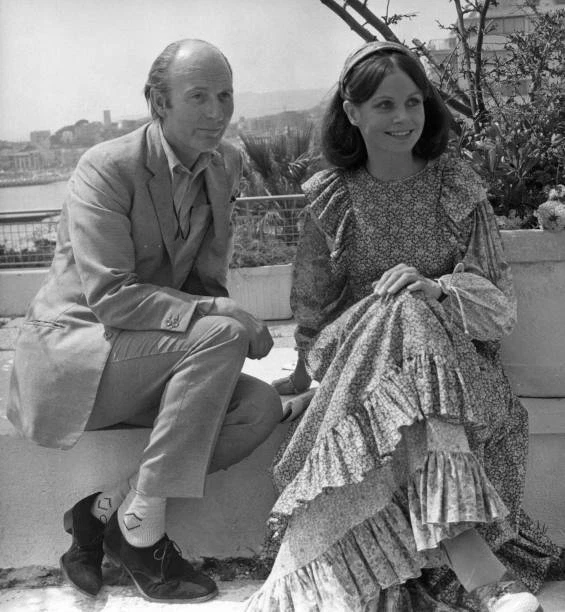SARAH MILES, BRITISH film actress is pictured sitting Alan Bri- 1973 ...
