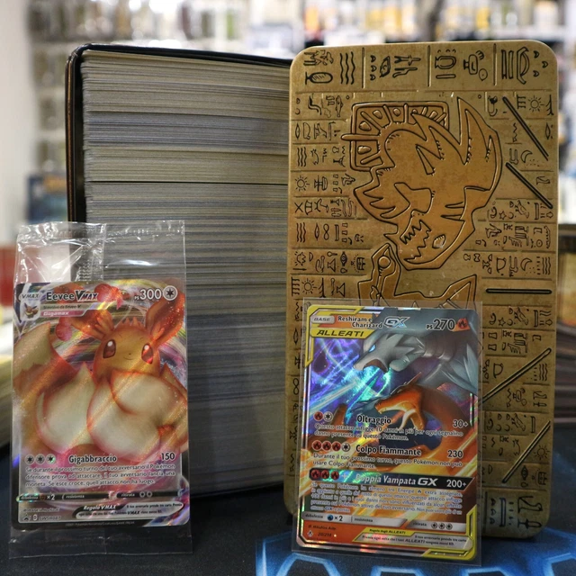 LOTTO POKEMON 450 carte + CHARIZARD & RESHIRAM gx ALLEATI + EEVEE VMAX ...