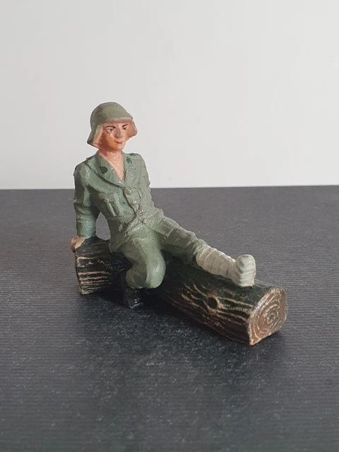 ELASTOLIN LINEOL SOLDAT verwundet auf Baumstamm sitzend CH Militär II. WK Masse EUR 44,99 ...