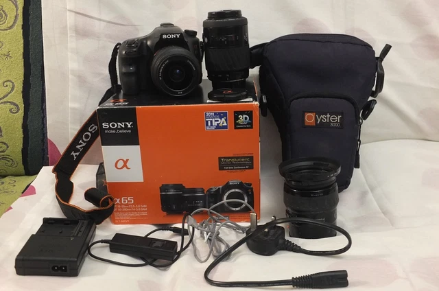 SONY ALPHA A65 24 mp SLT DSLR, boxed, 18-55mm, 70-210mm &28-105xi ...