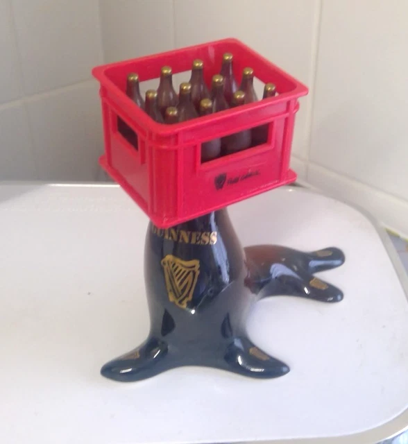 GUINNESS SEAL / Sea Lion balancing crate of Guinness Collectable ...