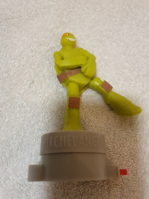 TEENAGE MUTANT NINJA Turtles Michaelangelo Burger King Spinning Toy £2. ...