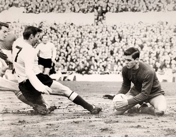 CHELSEA GOALKEEPER JOHN Dunn Gathers The Ball A The Feet Of To 1960s ...