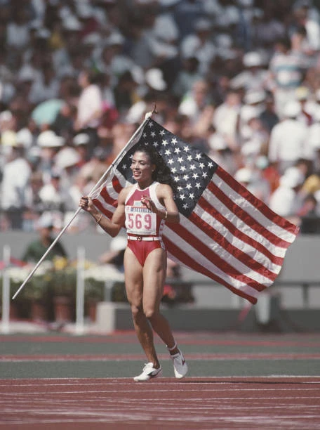 FLORENCE GRIFFITH-JOYNER CARRYING the Stars and Stripes flag USA c- Old ...