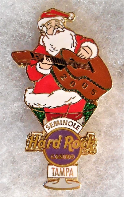 HARD ROCK HOTEL Tampa Santa Playing Guitar Standing In Martini Glass ...