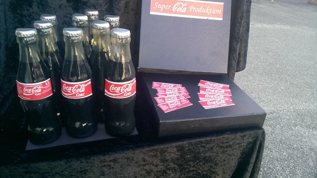 APPEARANCE OF 9 Bottles of Coca Cola Glass (Fake) + Box & Labels £101. ...
