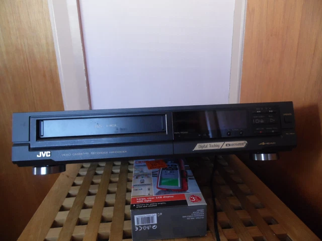 JVC VHS VIDEO recorder/player in black metal with remote; no ...