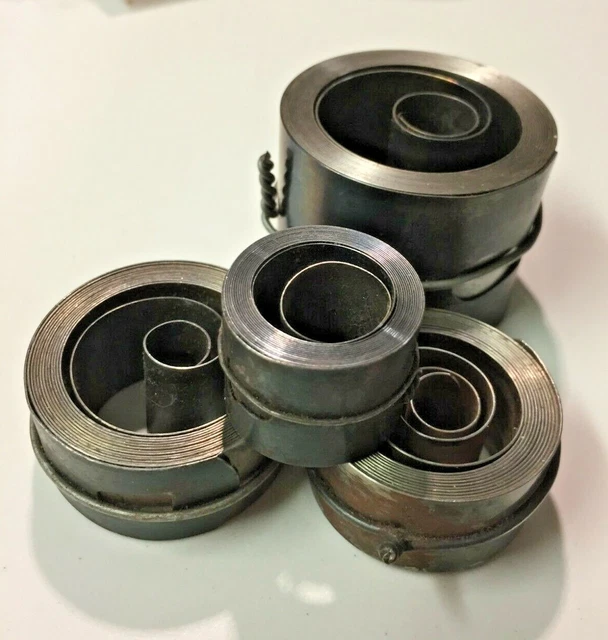 CLOCK MAINSPRING REPLACEMENT French,German,English New Old Stock Hole ...