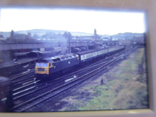 35MM RAILWAY SLIDE 47197 leaves Perth Station on Inverness Motorail ...