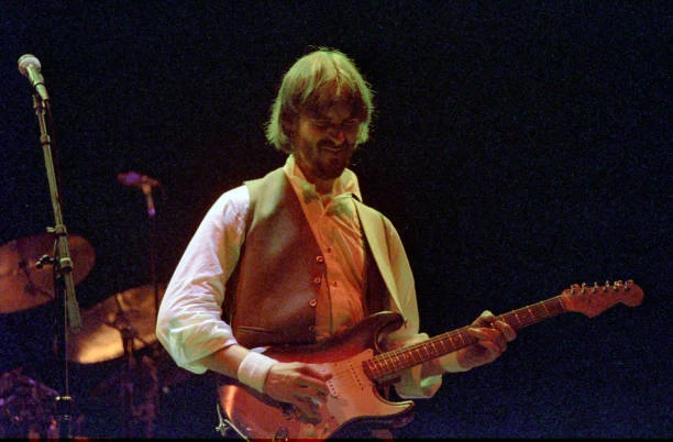 SINGER SONGWRITER DAN Fogelberg performs onstage with a Fender Stra Old ...