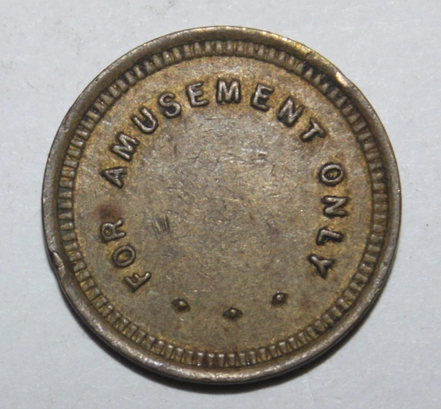 OLD ARCADE TOKEN ~ 21mm brass ~ "PART & PROPERTY OF THE MACHINE ...