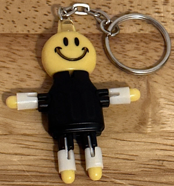 PORTE-CLÉS MOBILE FIDGET Smiley Face Smokebuddy élastique posable noir ...