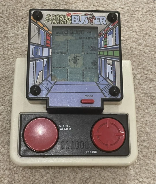 ELECTRONIC GAME ALIEN Buster hand held 1990s retro vintage Computer LCD ...