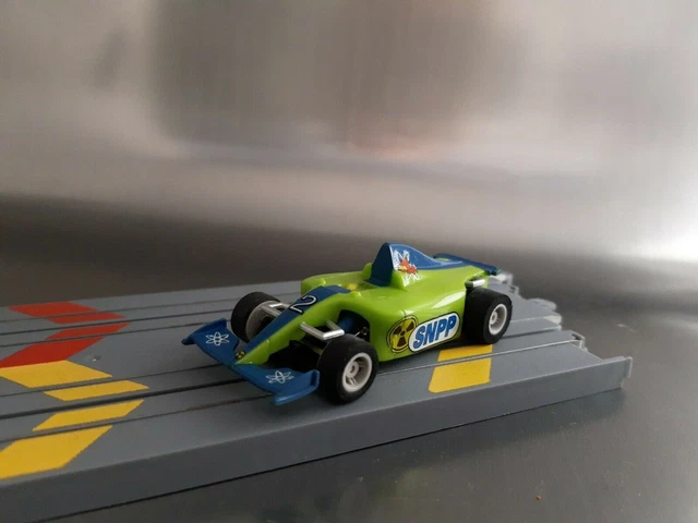 MICRO SCALEXTRIC HOMER Simpsons SNPP F1 Car Number 2 working 1:64 Free ...