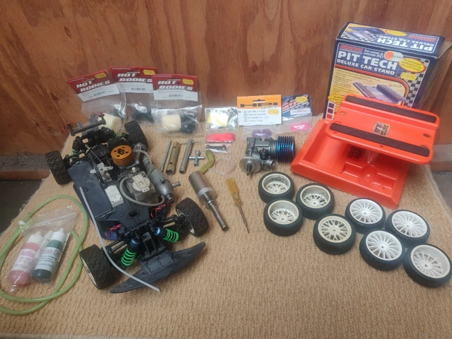 2 RADIO CONTROLLED cars nitro with spare parts kyosho car and tempo ...