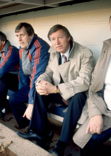 ALEX FERGUSON SITTING in the dugout next to Norman Davies during - Old ...