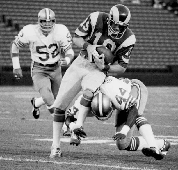 LOS ANGELES RAMS Receiver Lance Rentzel makes a reception and is i ...