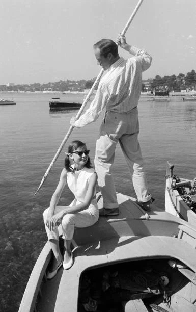 MEL FERRER AND his wife Audrey HEPBURN take a holiday in a whit 1956 ...