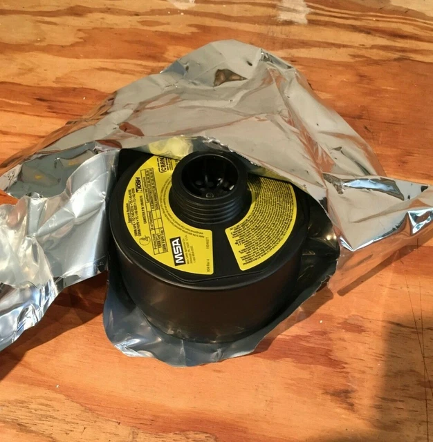 OEM MSA CBRN Canister Part no 10046570 Expiration Date 04 15 Open PKG OEM MSA CBRN Canister Part no 10046570 Expiration Date 04 15 Open PKG