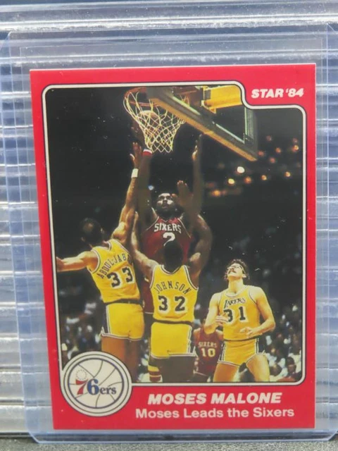 1983-84 STAR PHILADELPHIA 76ers champions du monde Moses Malone mène ...