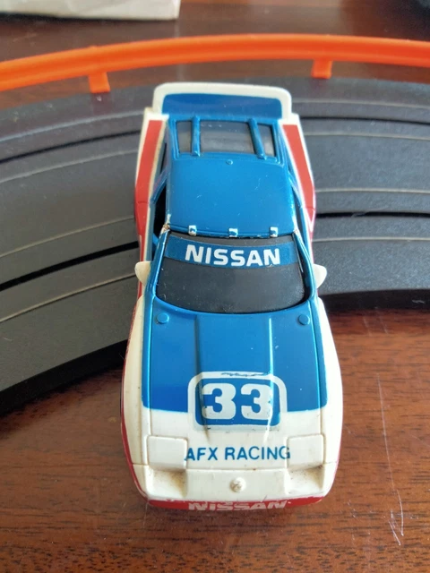 VINTAGE AURORA TOMY AFX HO SCALE SLOT CAR #33 NISSAN WORKING $40.00 ...