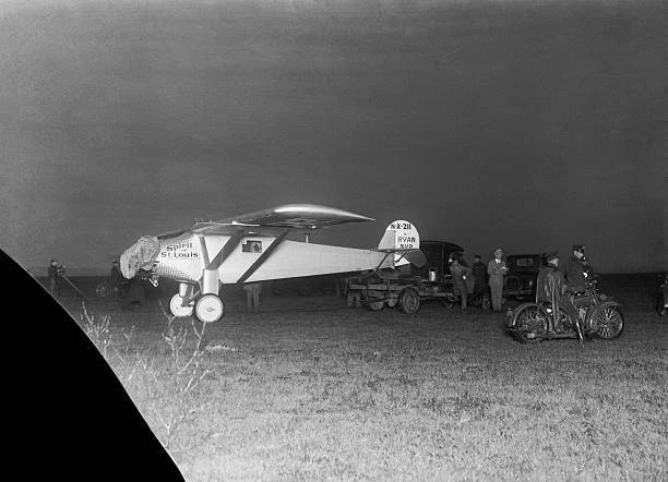 CHARLES LINDBERGH'S PLANE is shown as it was being fueled up be- 1927 ...