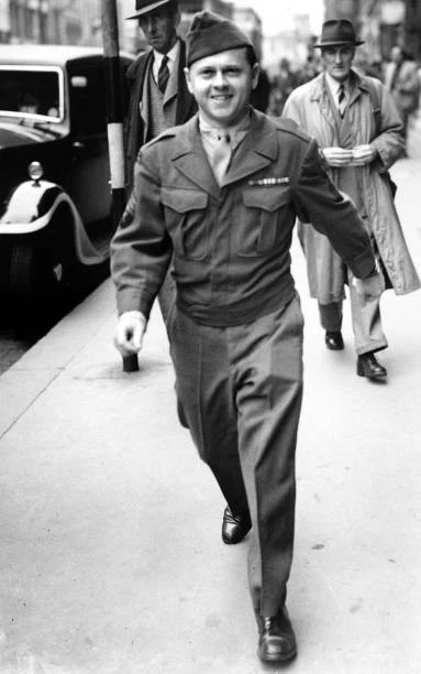 Army Sergeant Mickey Rooney Walks Down A Pavement Watched By B 1945 2704