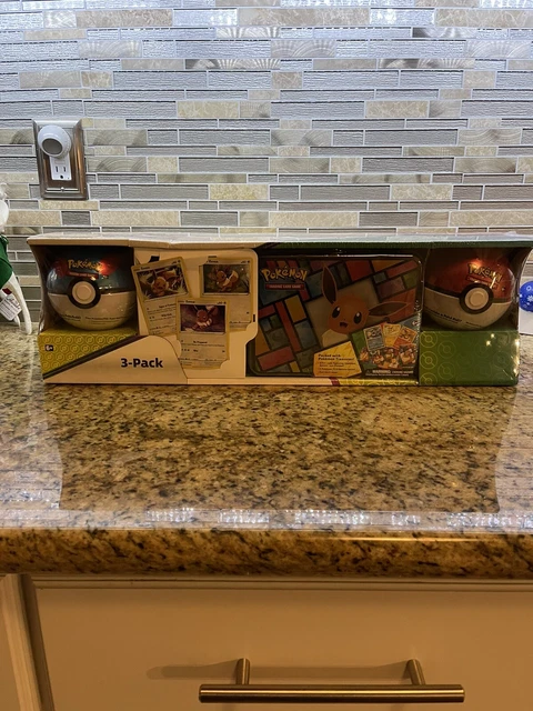 POKÉMON TCG: EEVEE Collector's Treasure Chest with 2 Poké Ball Tins (3 ...