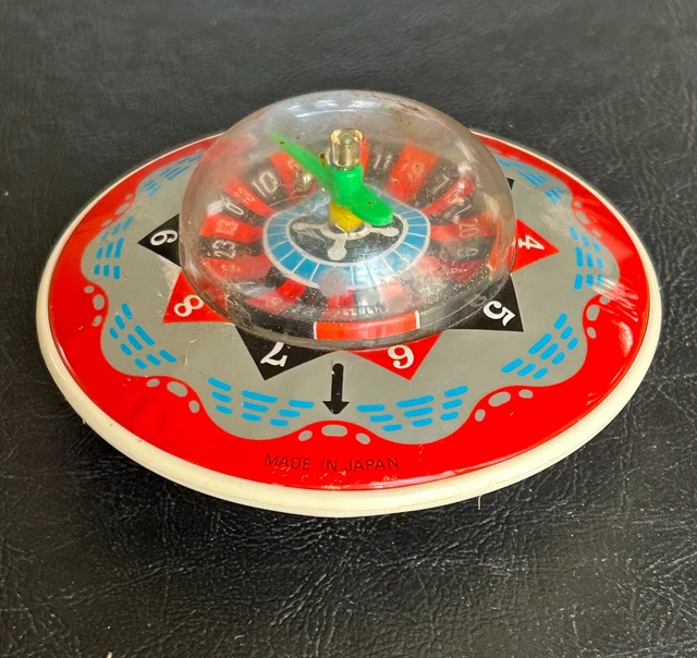 VINTAGE 1970S ROULETTE Wheel Flying saucer on wheels Tin Friction Toy ...