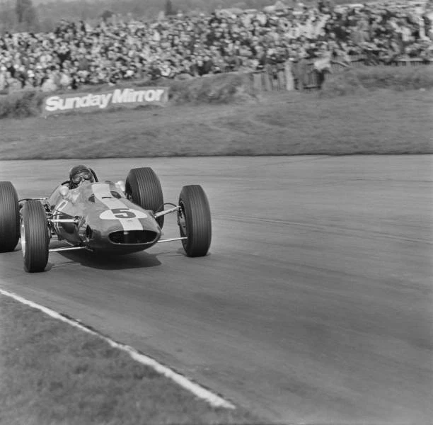 SCOTTISH RACING DRIVER Jim Clark driving a Team Lotus Lotus 33 1960s ...