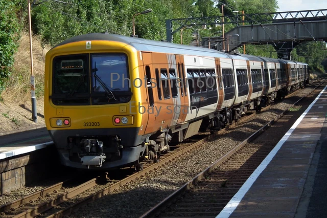 CLASS 323 323203, 3 car EMU, in West Midlands Trains at Gravelly Hill ...
