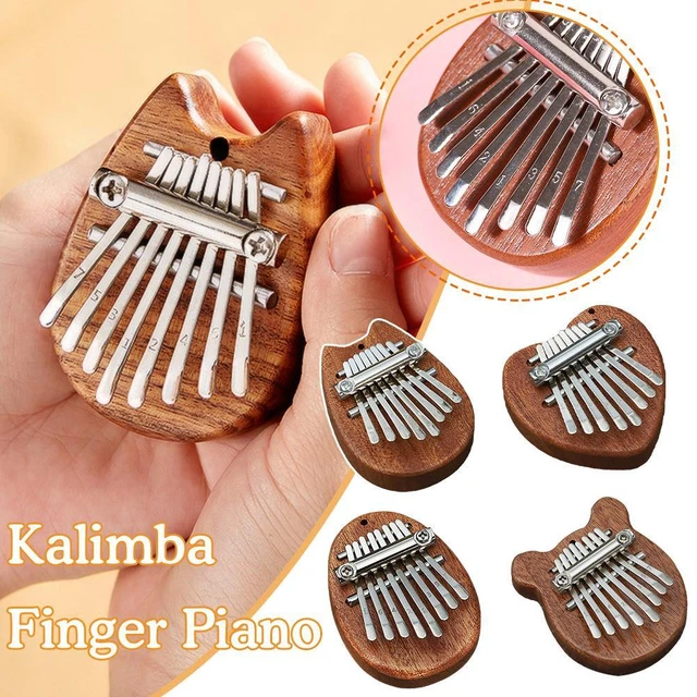 MINI PIANO POUCE 8 tons Mini Kalimba Finger Piano Instrument portable ...