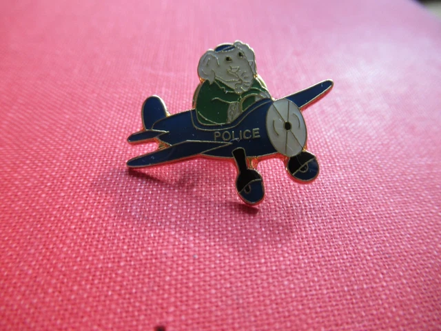 RUPERT BEAR'S FRIEND Edward Trunk Flying Police Aeroplane Pin Badge £5. ...