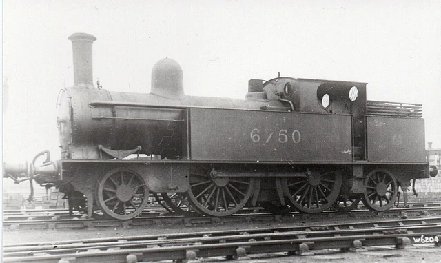 EX LNWR/LMS CLASS 1P 2-4-2T No 6750 @ UNKNOWN LOCATION R/PHOTO £1.50 ...