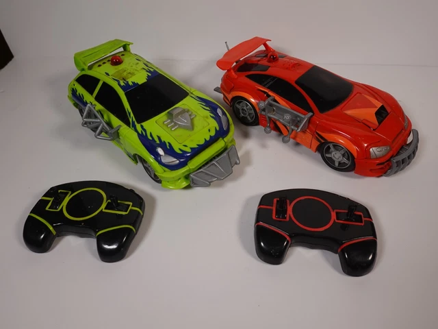 RUMBLE CARS FIREBLASTER XJ & Colt V12 Interactive Fighting Cars £35.00 ...