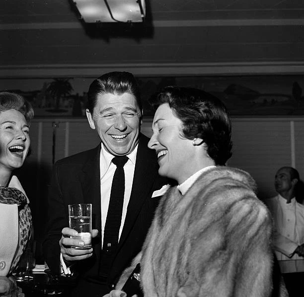 ACTOR RONALD REAGAN and his wife actress Nancy Reagan attend a 20t ...