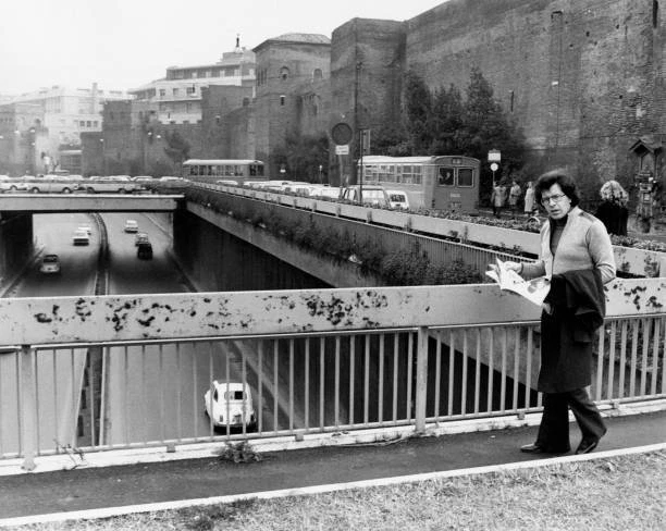 ITALIAN SINGER PEPPINO di Capri walking in street with a newspaper ...