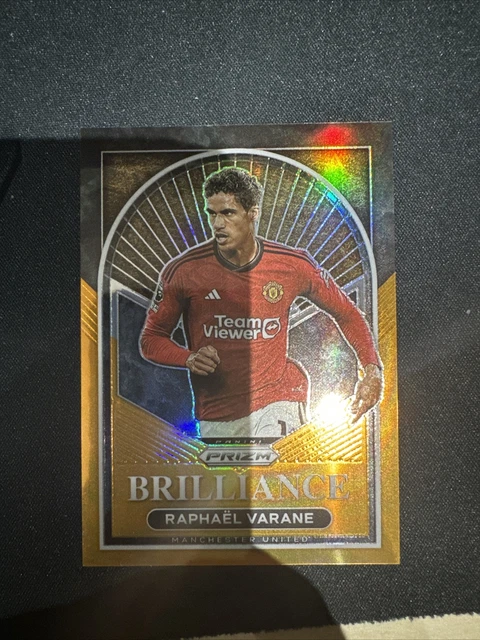 2023-24 PANINI PRIZM Premier League Raphael Varane Oro Brillantezza/25 ...