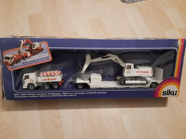SIKU 4012 MAN Tieflader mit MENCK Großbagger "Heitkamp" 1:55 OVP EUR 85,99 - PicClick DE