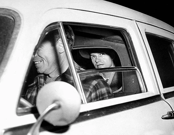 ALGER HISS LEAVING in taxi after his sentencing at Federal Court i ...