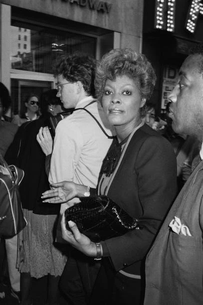 SINGER ACTRESS DIONNE Warwick among a group of unspecified people - Old ...