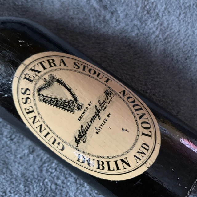 C1950S ERA GUINNESS EXTRA STOUT DUBLIN AND LONDON BOTTLE SHAPE ADV ...