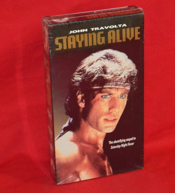 STAYING ALIVE (1983) New Sealed VHS Video Tape Movie John Travolta £8. ...