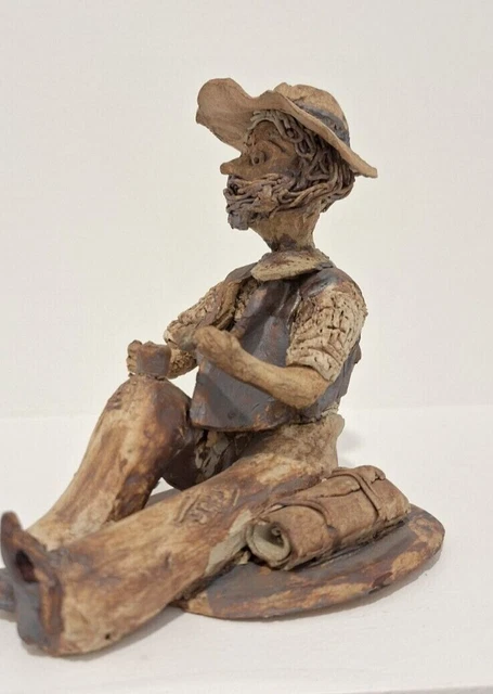 AUSTRALIANA HAND MADE pottery figurine/sculpture - Sitting Swagman $15. ...